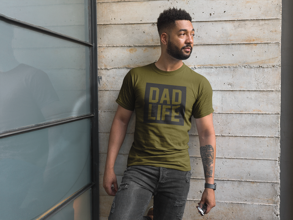 Dad-t-shirt-mockup-featuring-a-man-with-a-beard-against-a-concrete-wall ...